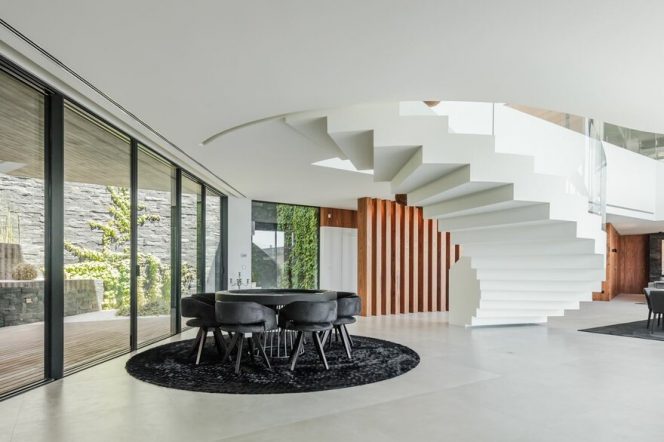 V-Shaped Concrete House by TRAMA arquitetos in Braga, Portugal ...